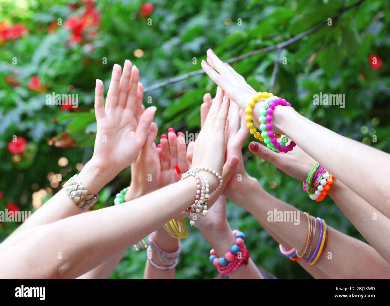 Group of young people hands outdoors Stock Photo - Alamy