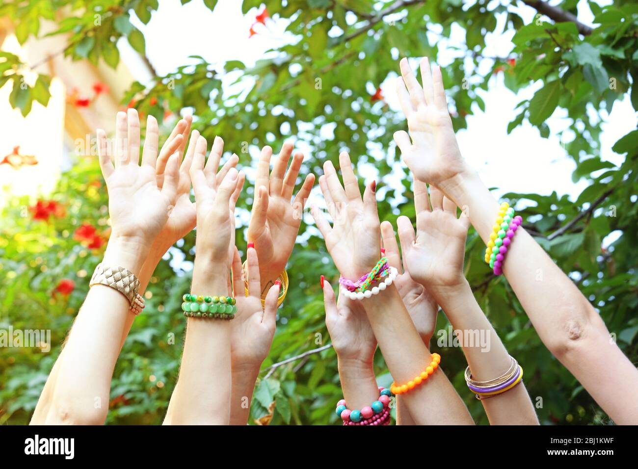 Group of young people hands outdoors Stock Photo - Alamy