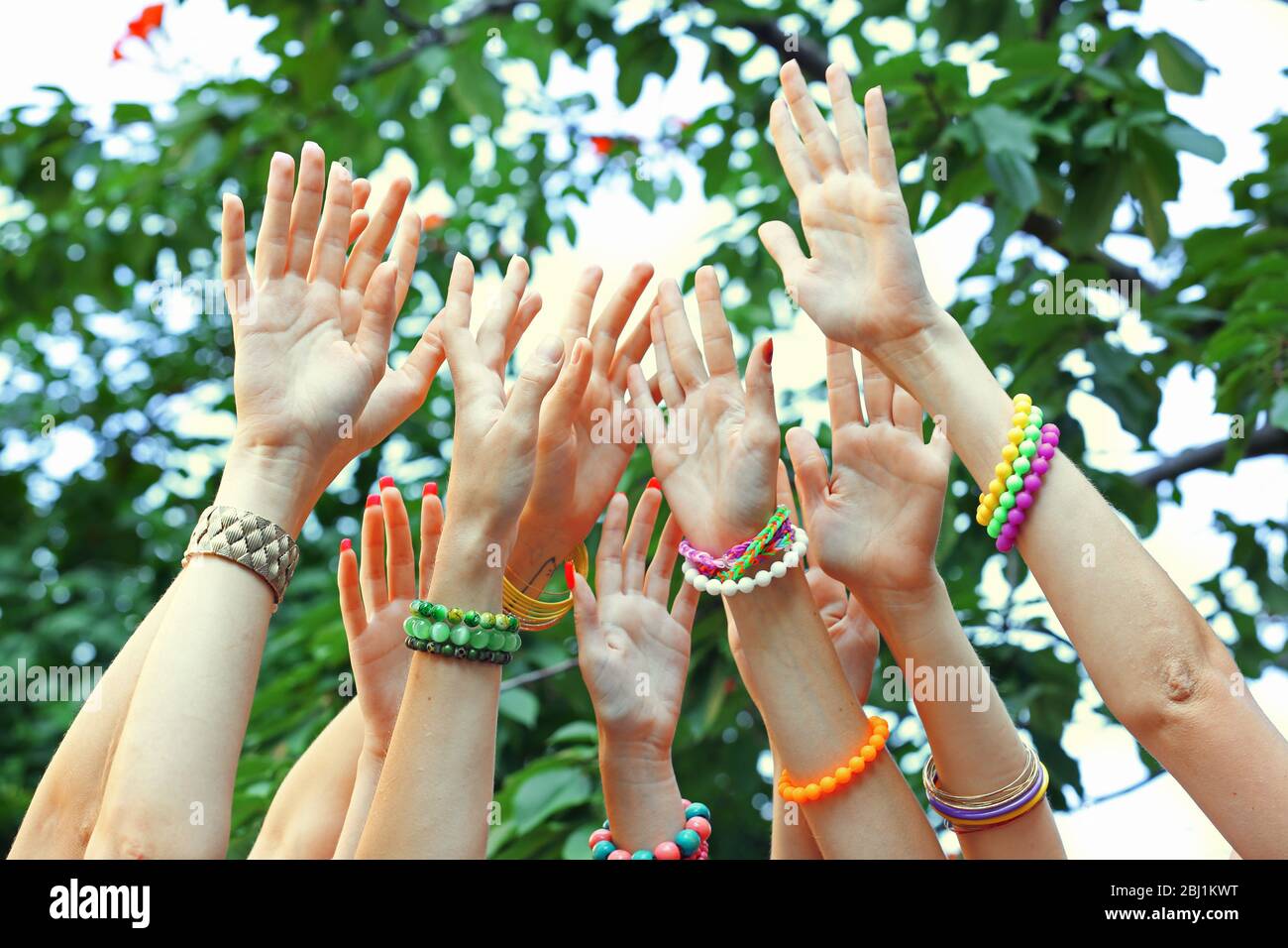 Group of young people hands outdoors Stock Photo - Alamy