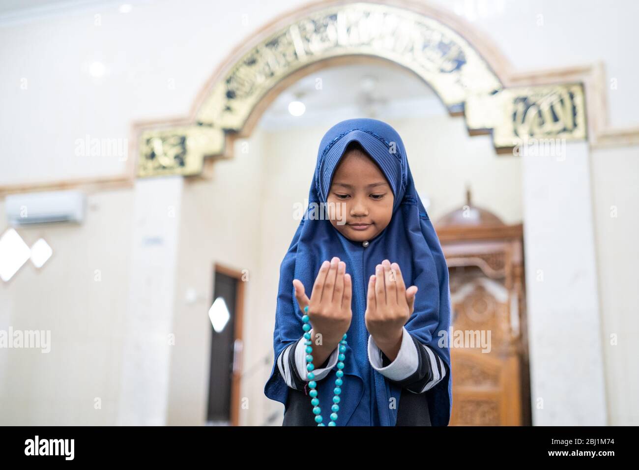 Muslim Child Praying Hands