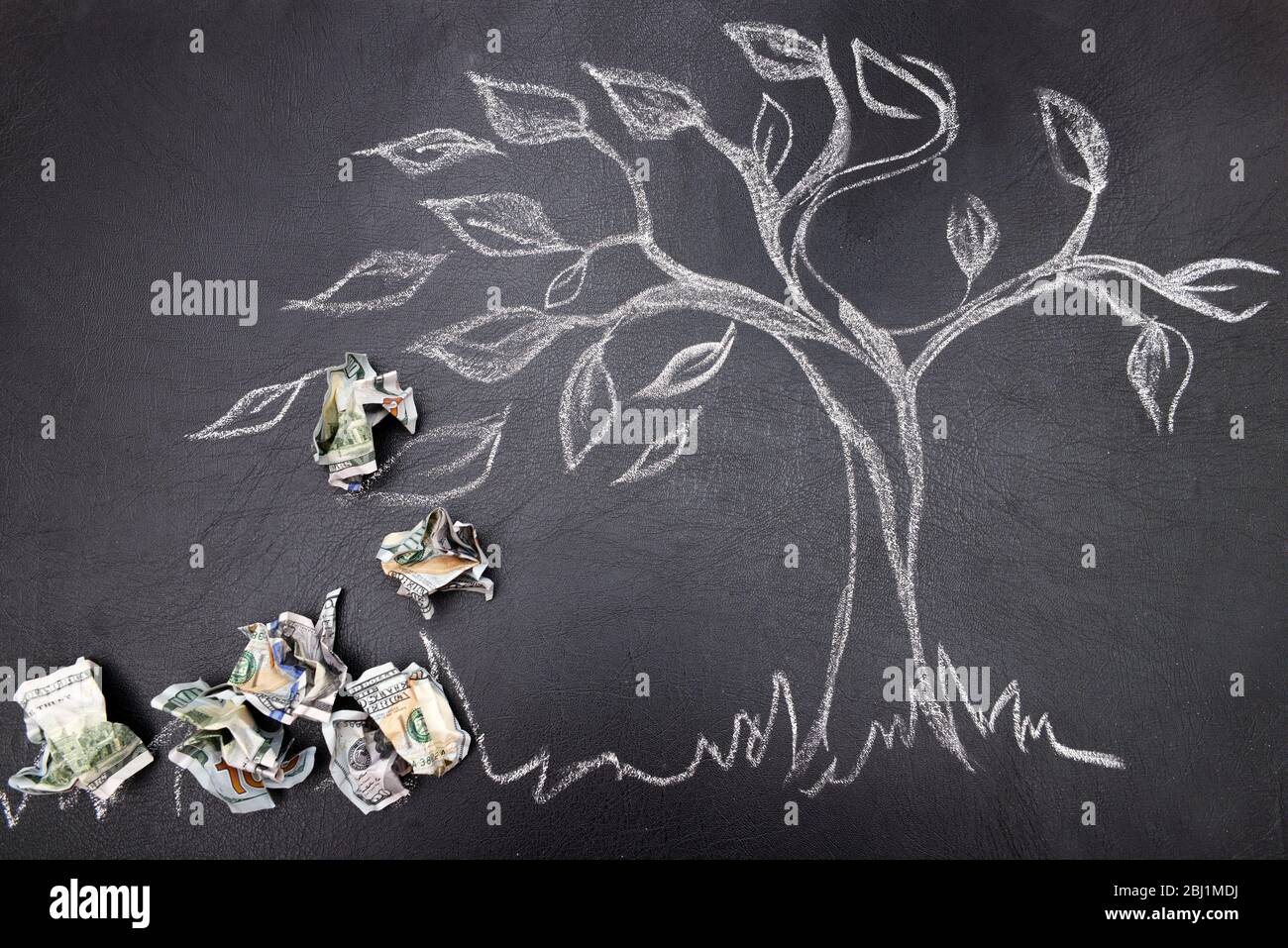 Money tree drawing on blackboard close up Stock Photo - Alamy