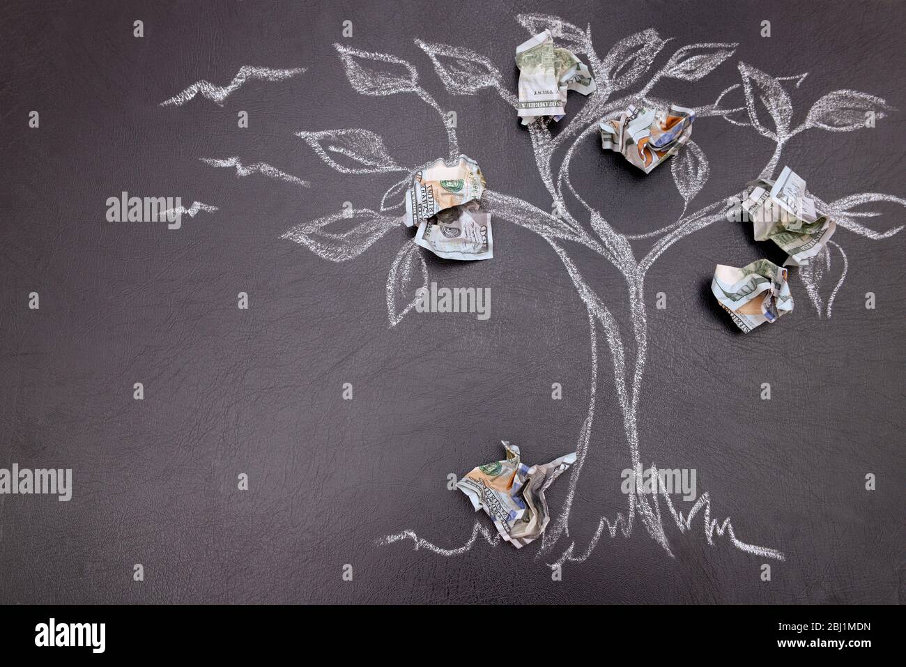 Money tree drawing on blackboard close up Stock Photo - Alamy