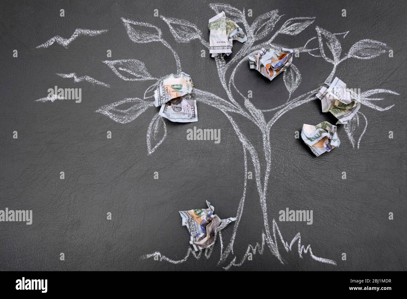 Money tree drawing on blackboard close up Stock Photo - Alamy
