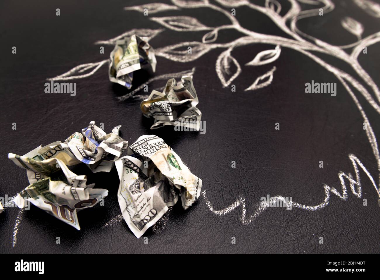 Money tree drawing on blackboard close up Stock Photo - Alamy