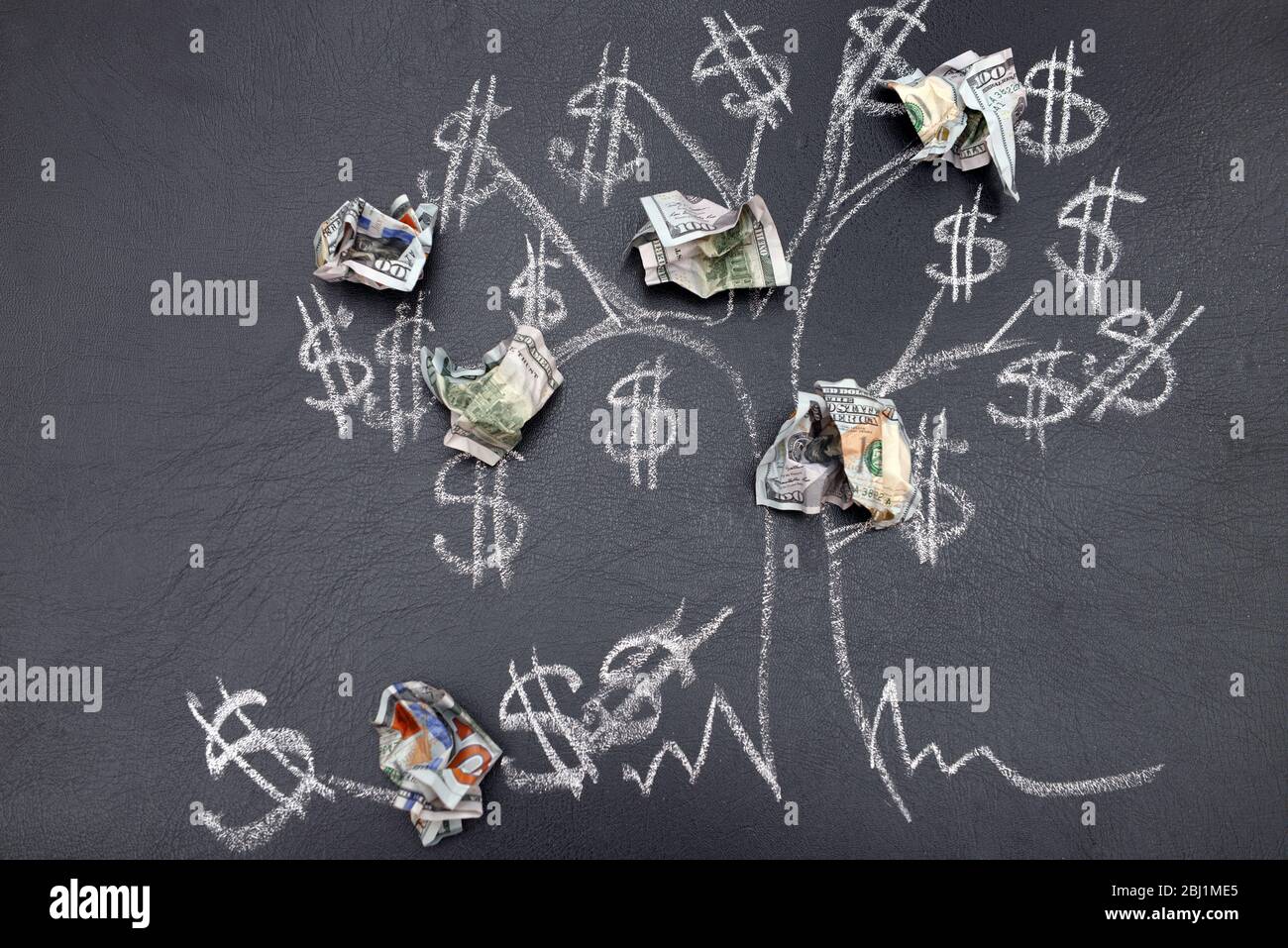 Money tree drawing on blackboard close up Stock Photo - Alamy