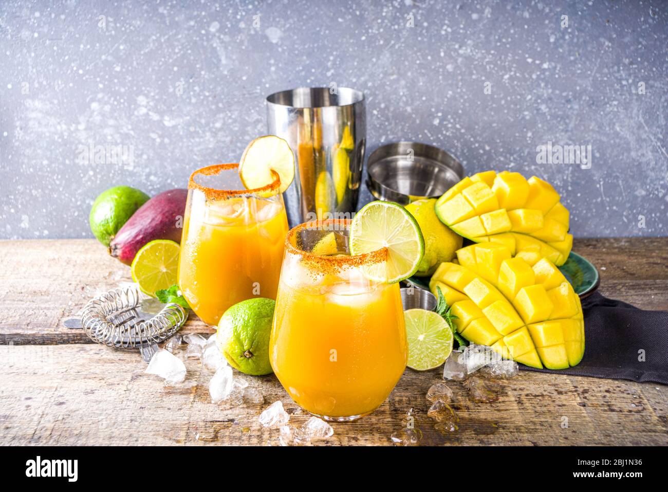 Summer tropic mexican cold cocktail. Mango margarita cocktail, with ...