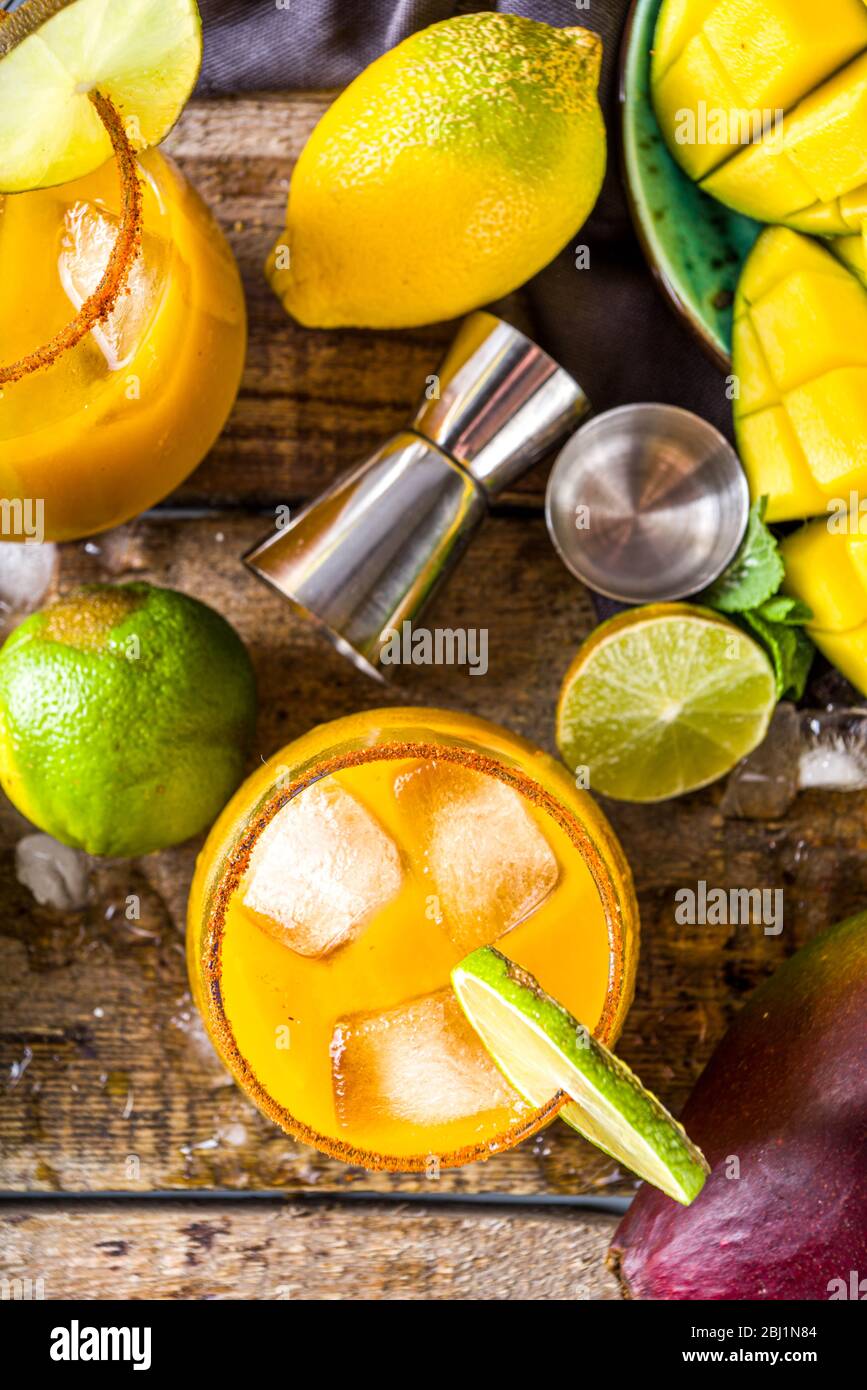 Summer tropic mexican cold cocktail. Mango margarita cocktail, with ...