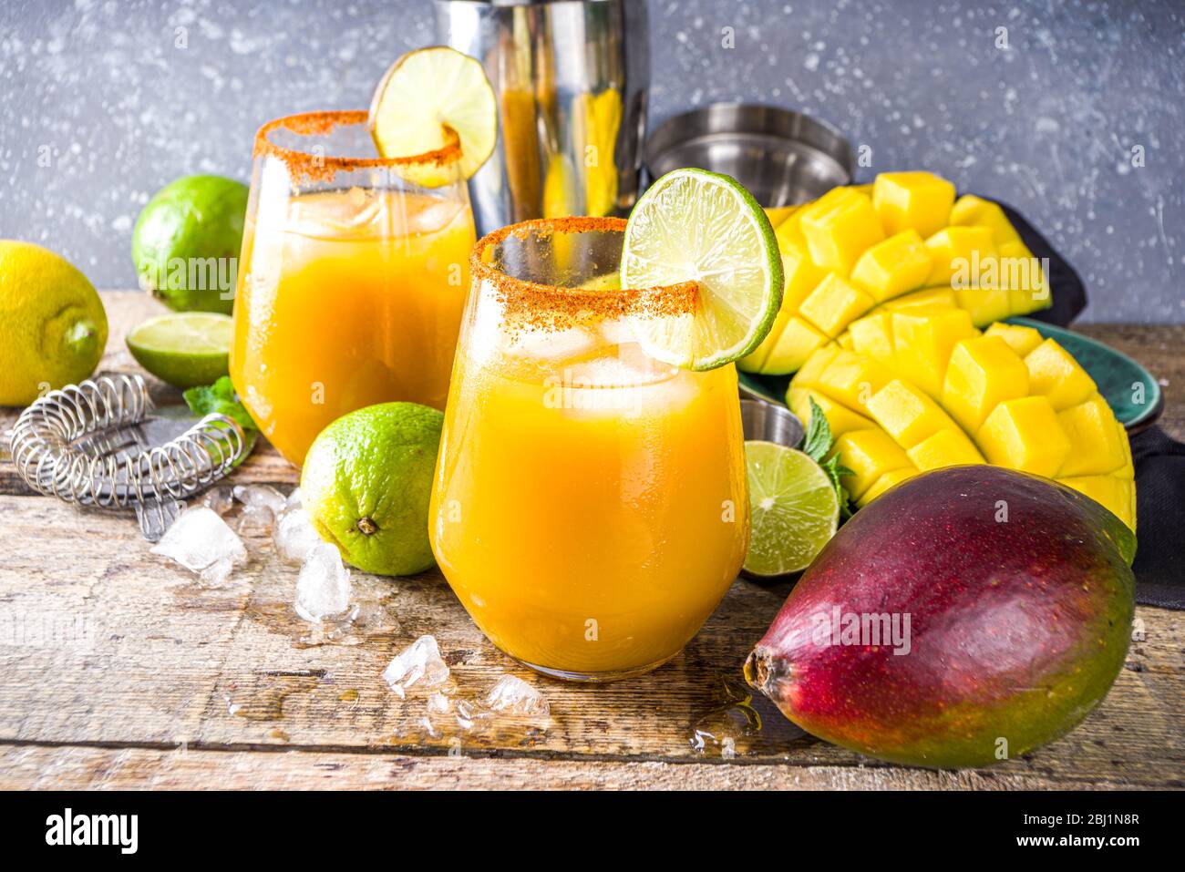Summer tropic mexican cold cocktail. Mango margarita cocktail, with ...
