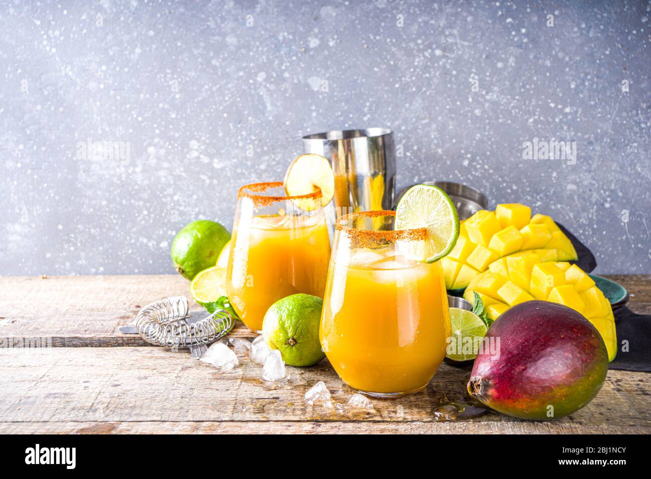 Summer tropic mexican cold cocktail. Mango margarita cocktail, with ...