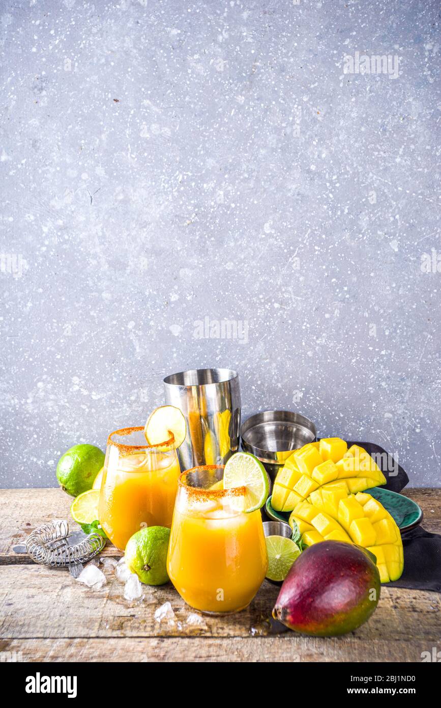 Summer tropic mexican cold cocktail. Mango margarita cocktail, with ...