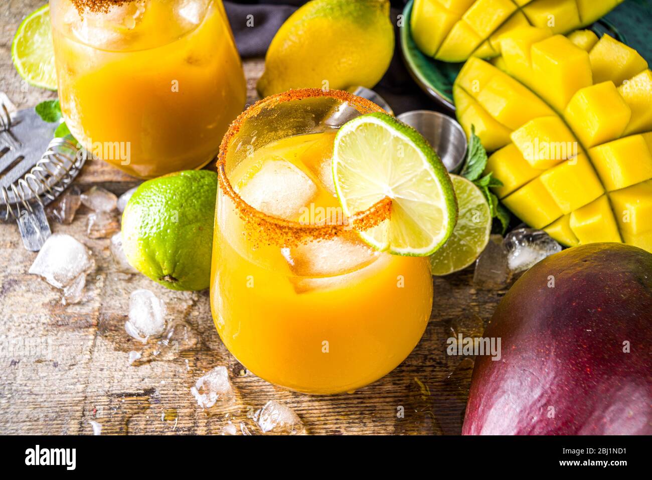 Summer tropic mexican cold cocktail. Mango margarita cocktail, with ...