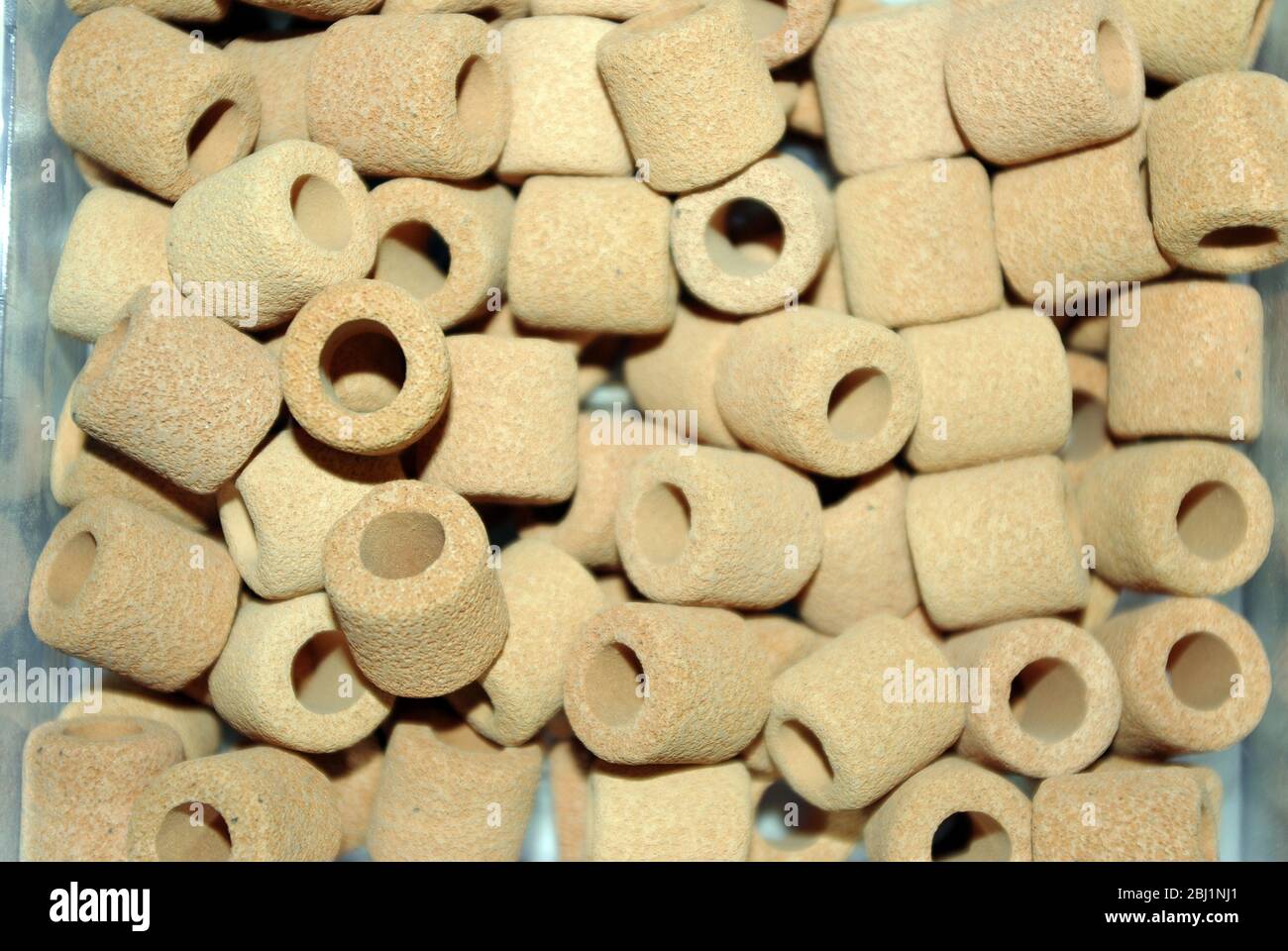 Ceramic elements for aquarium filter Stock Photo - Alamy