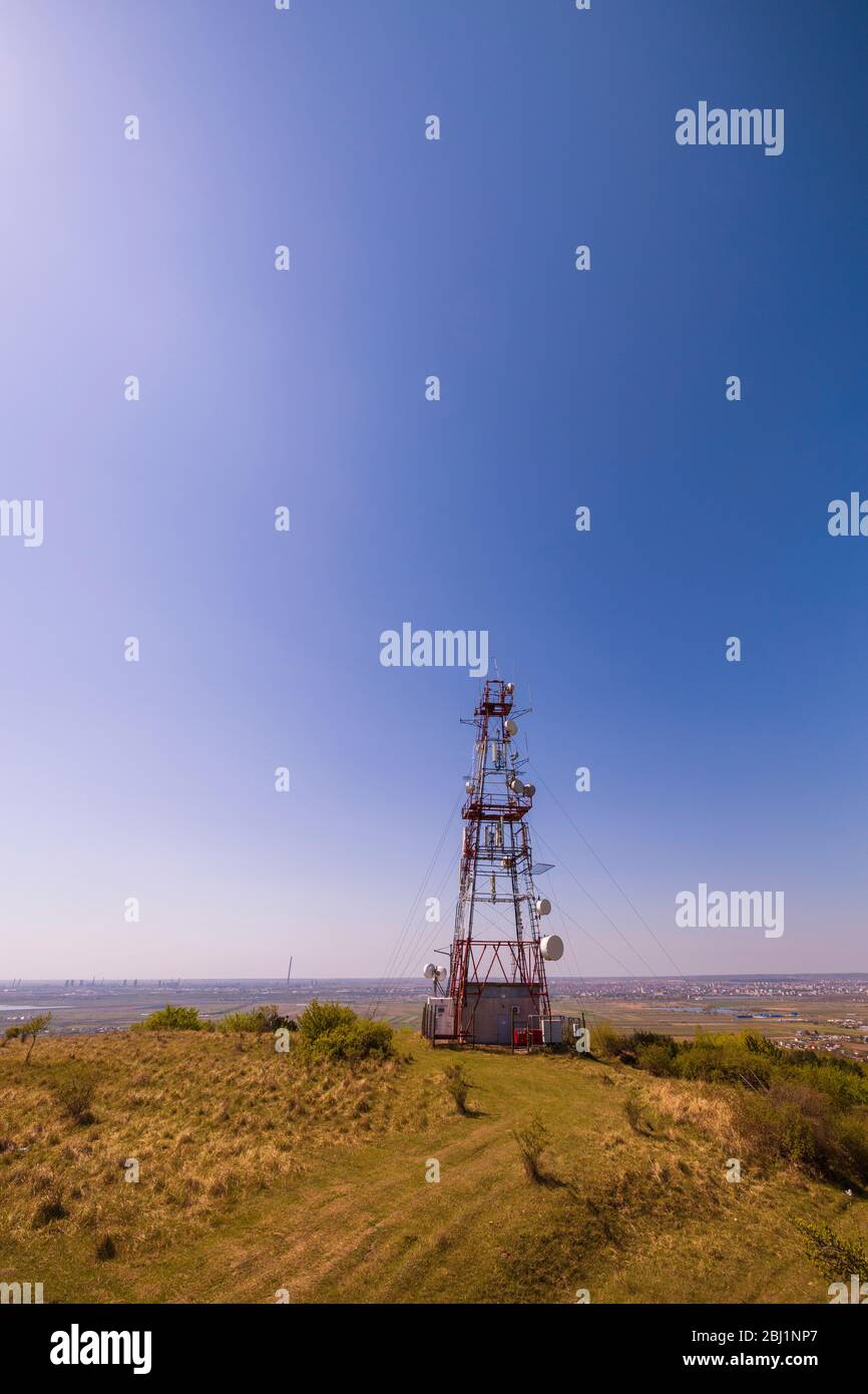 telecommunications tower with antennas on the hill Stock Photo - Alamy