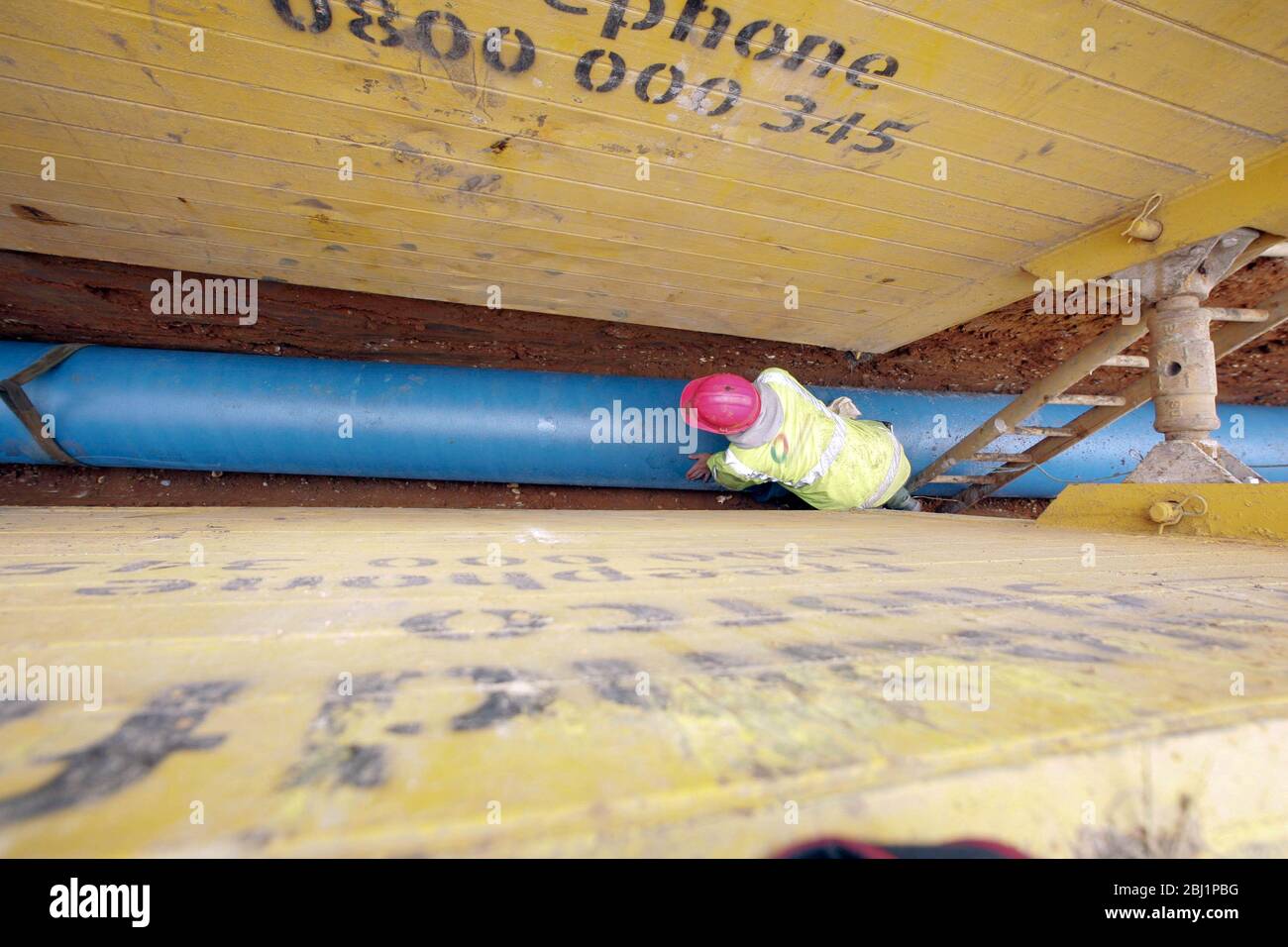 Installing a new water main A217 Burgh Heath, Surrey. Health and Safety ...