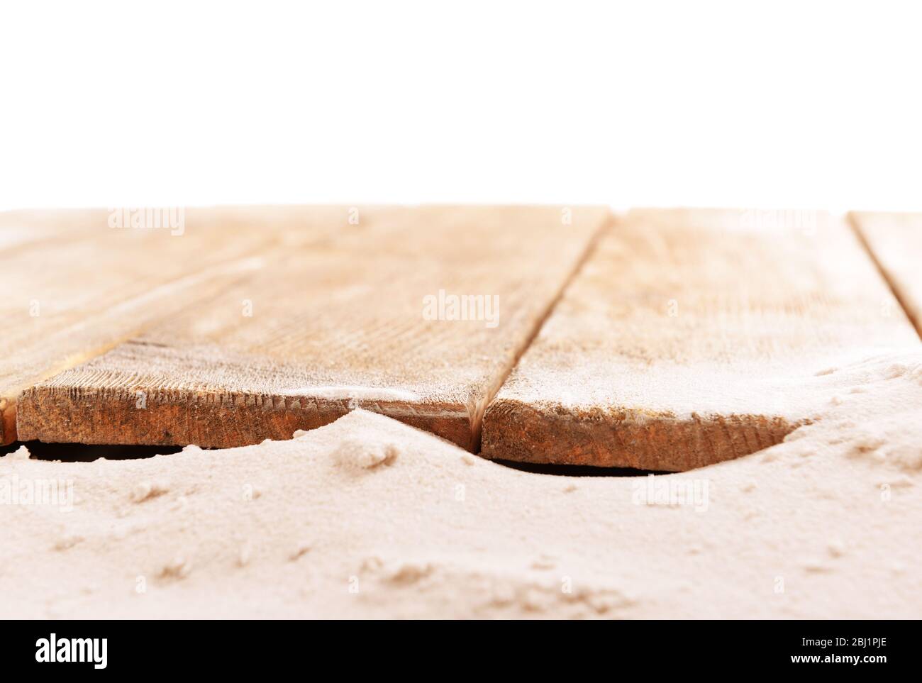 Sand with wooden planks isolated on white Stock Photo - Alamy