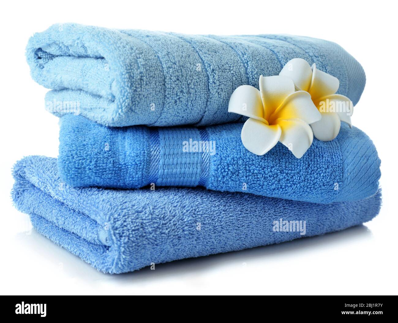 Stack of colorful towels isolated on white Stock Photo - Alamy