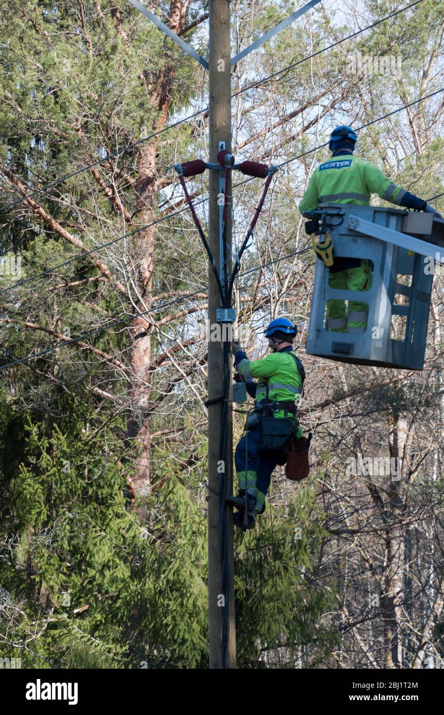 Men Repairing Powerlines Stock Photo - Alamy