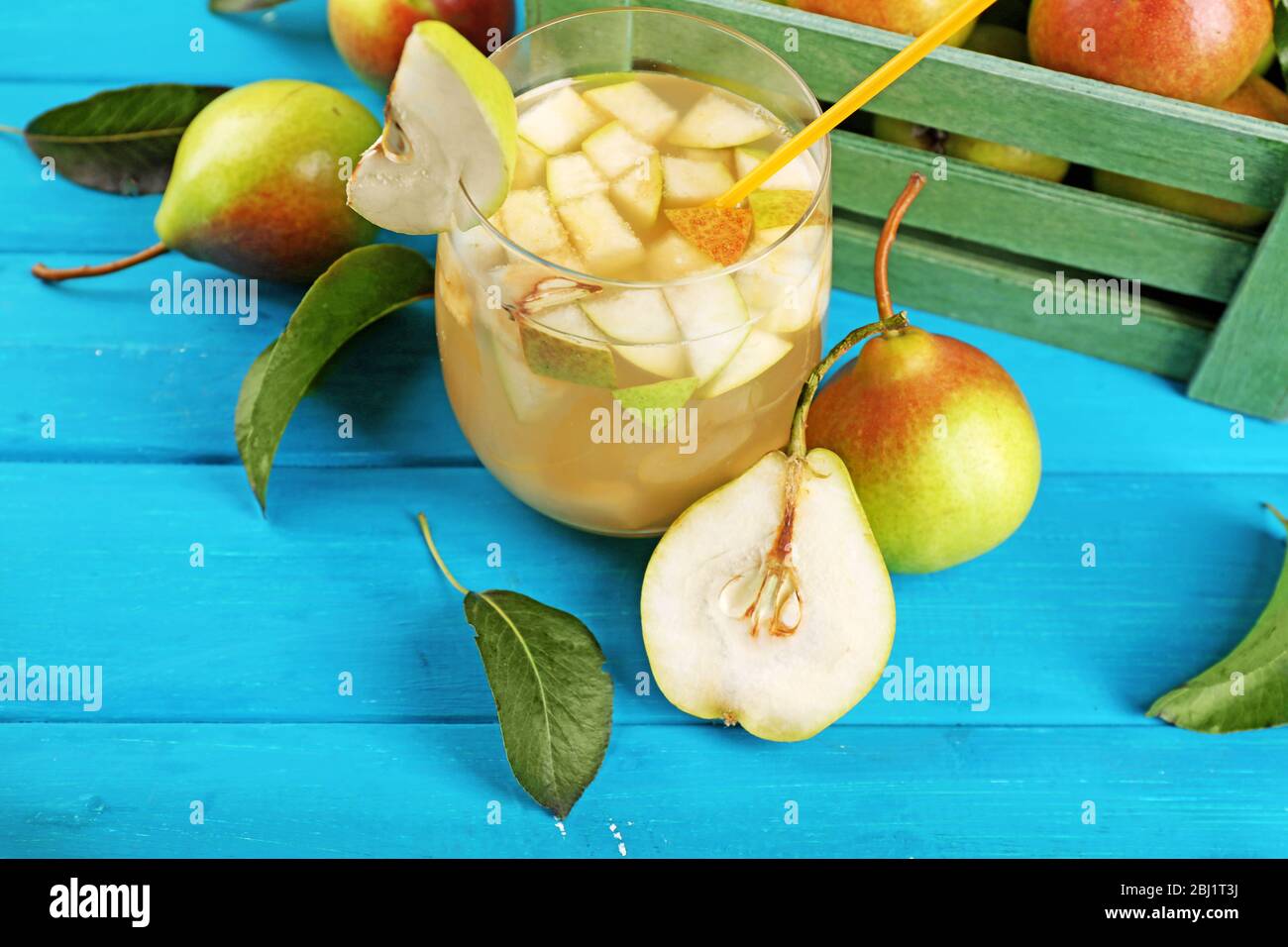 Fresh pear juice with fruit on table close up Stock Photo - Alamy