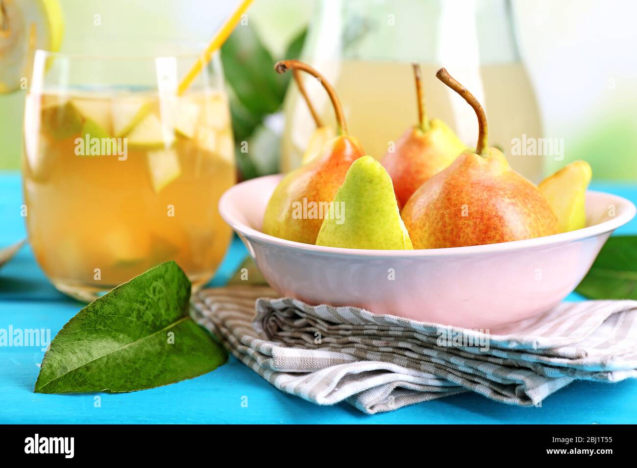 Fresh pear juice with fruit on table close up Stock Photo - Alamy