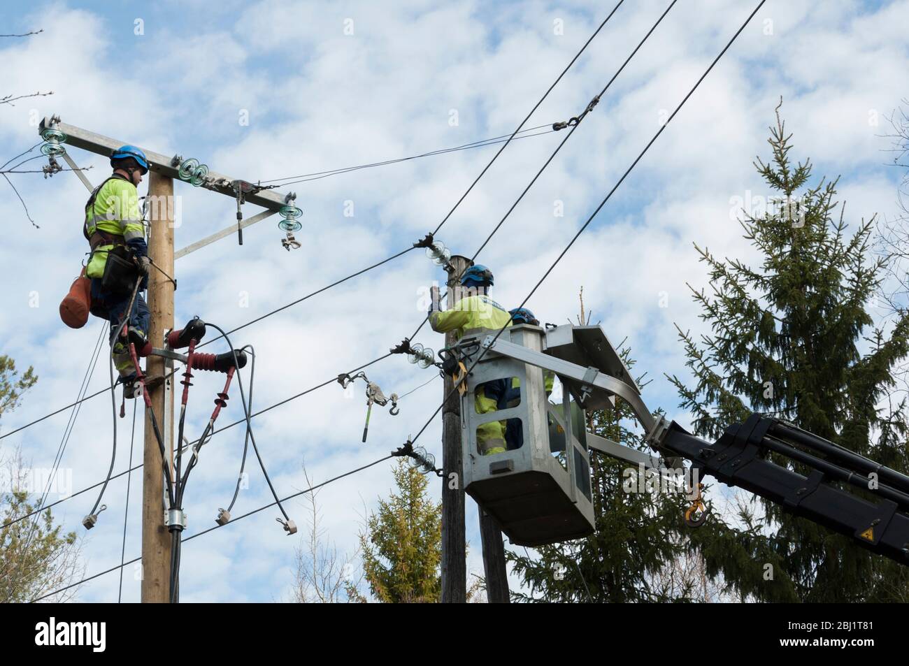 Men Repairing Powerlines Stock Photo - Alamy