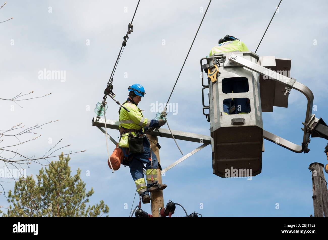 Men Repairing Powerlines Stock Photo - Alamy
