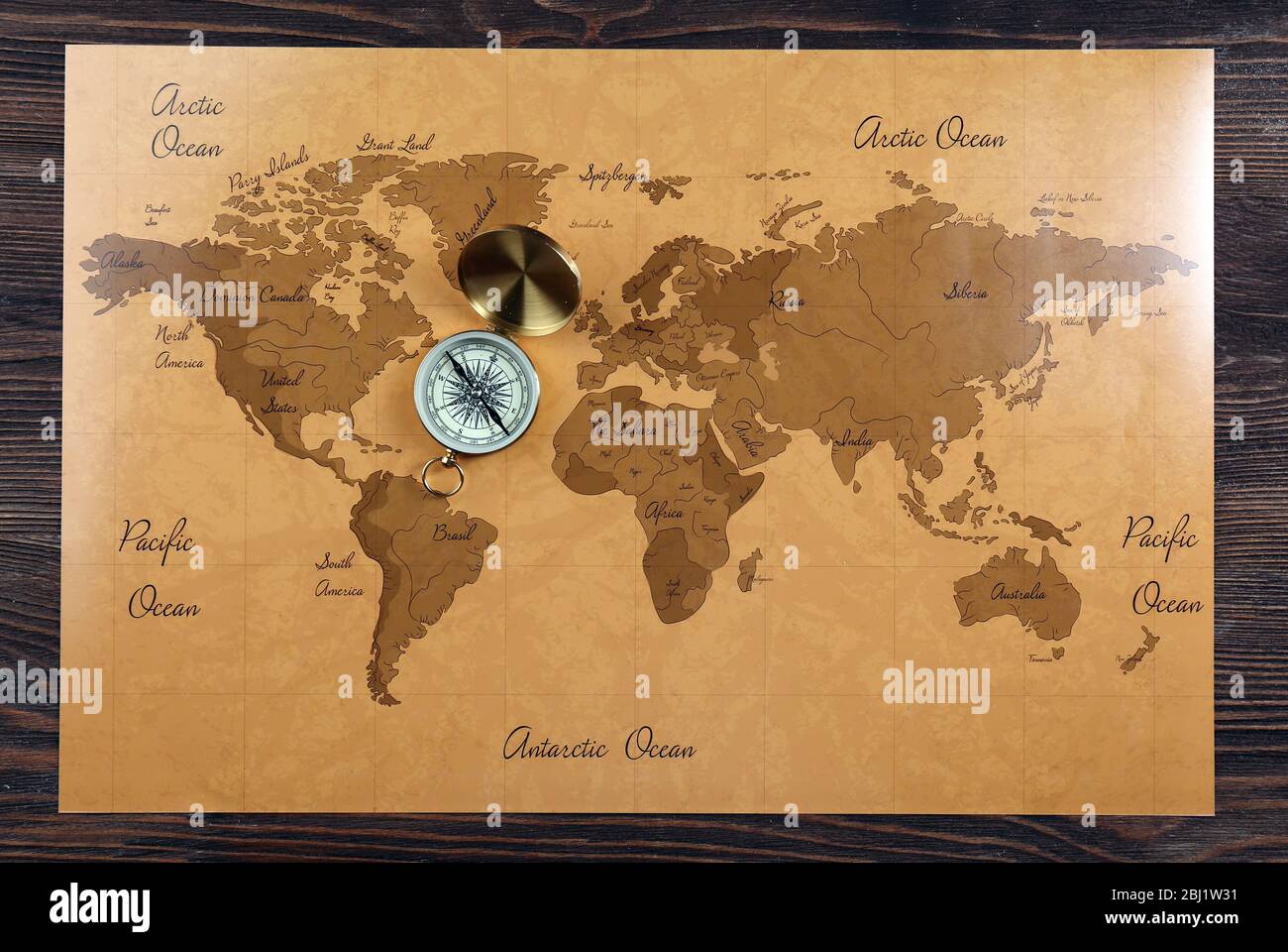 World man with compass close up Stock Photo - Alamy