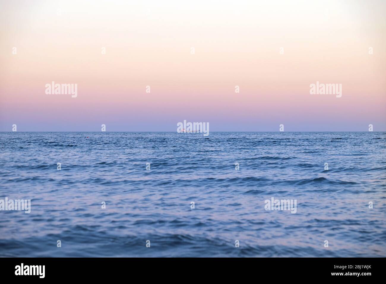 View of beautiful sunset on the beach Stock Photo - Alamy