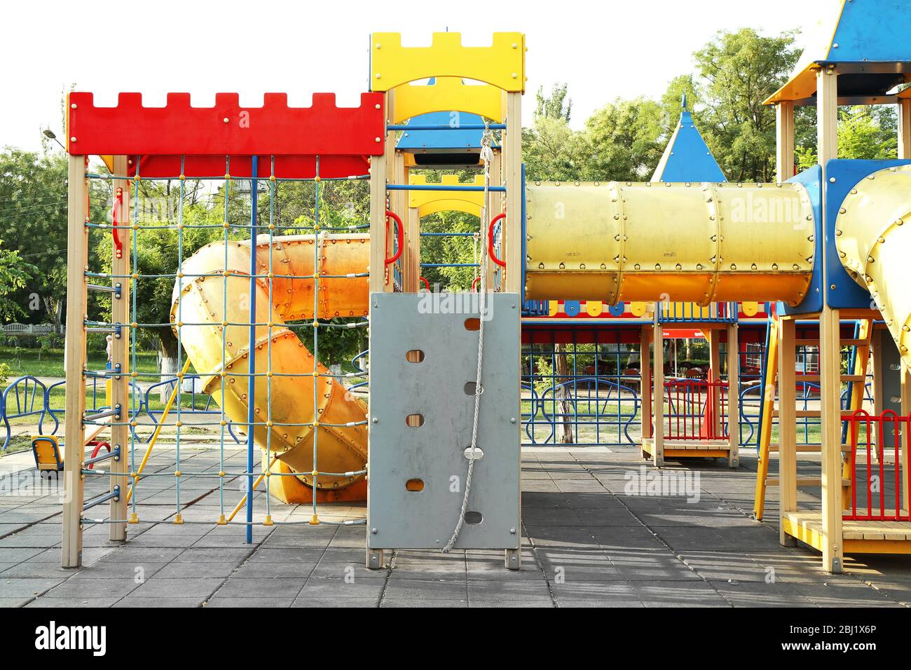 Colorful children playground in park Stock Photo - Alamy