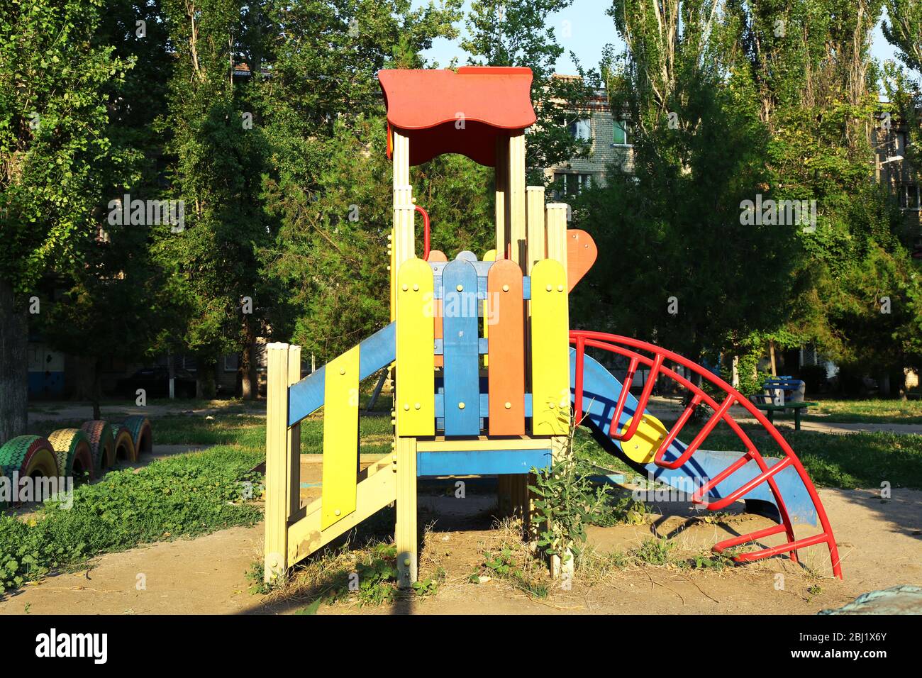 Colorful children playground in park Stock Photo - Alamy