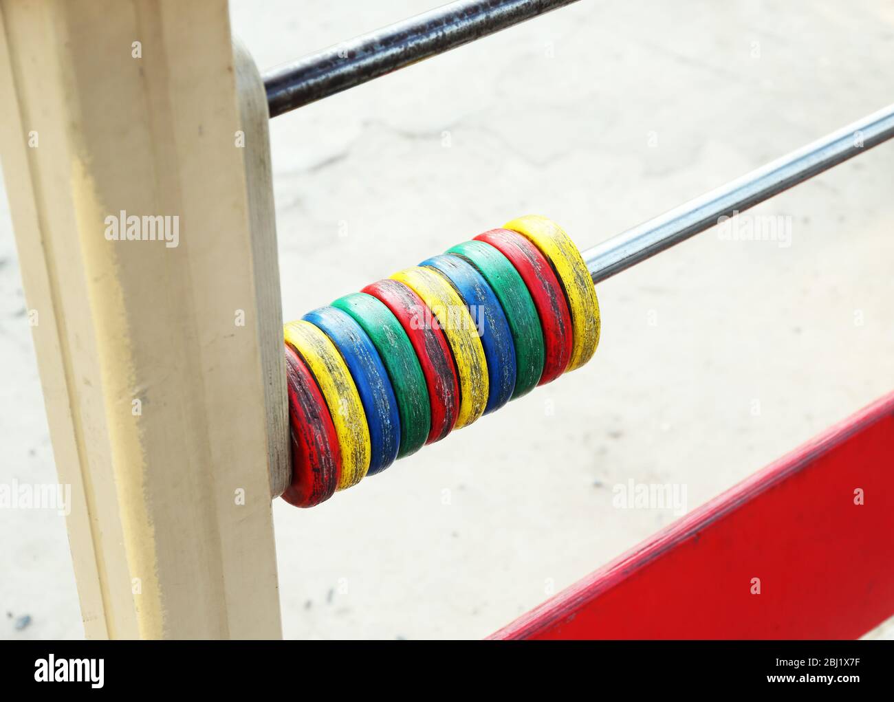 Colorful wooden rings for counting on children playground in park Stock ...