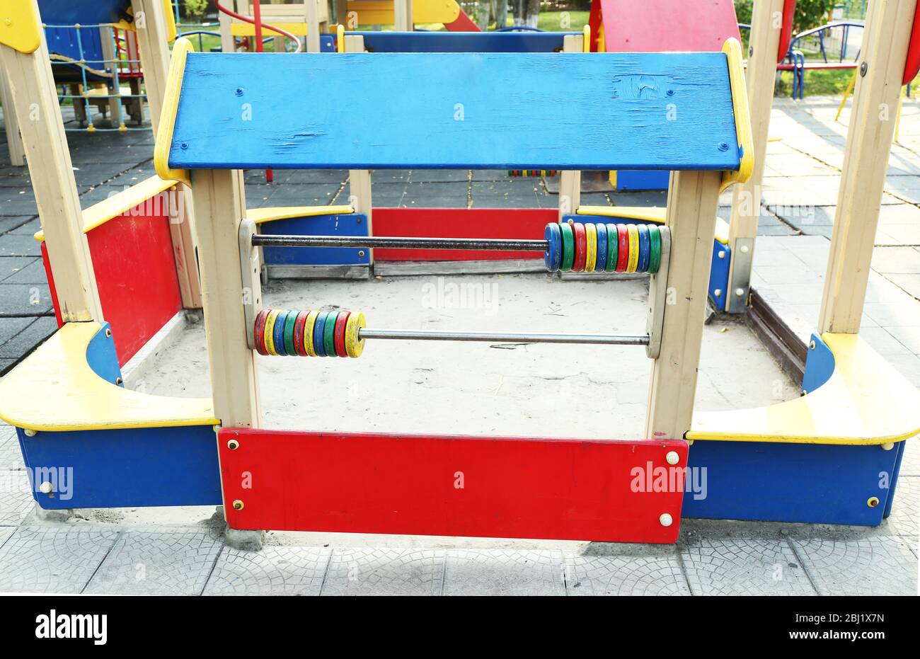 Colorful wooden rings for counting on children playground in park Stock ...