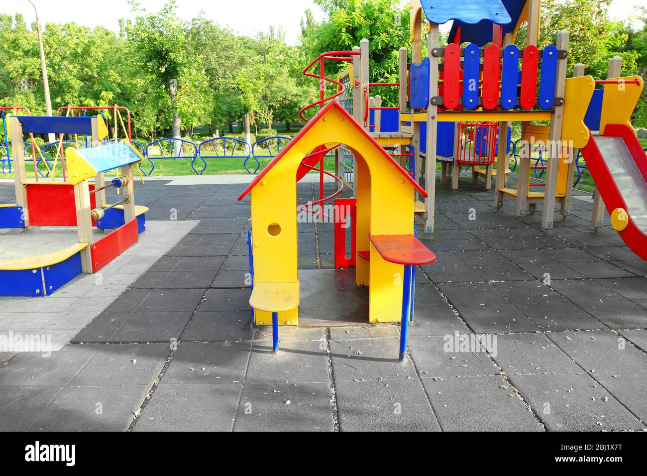 Colorful children playground in park Stock Photo - Alamy