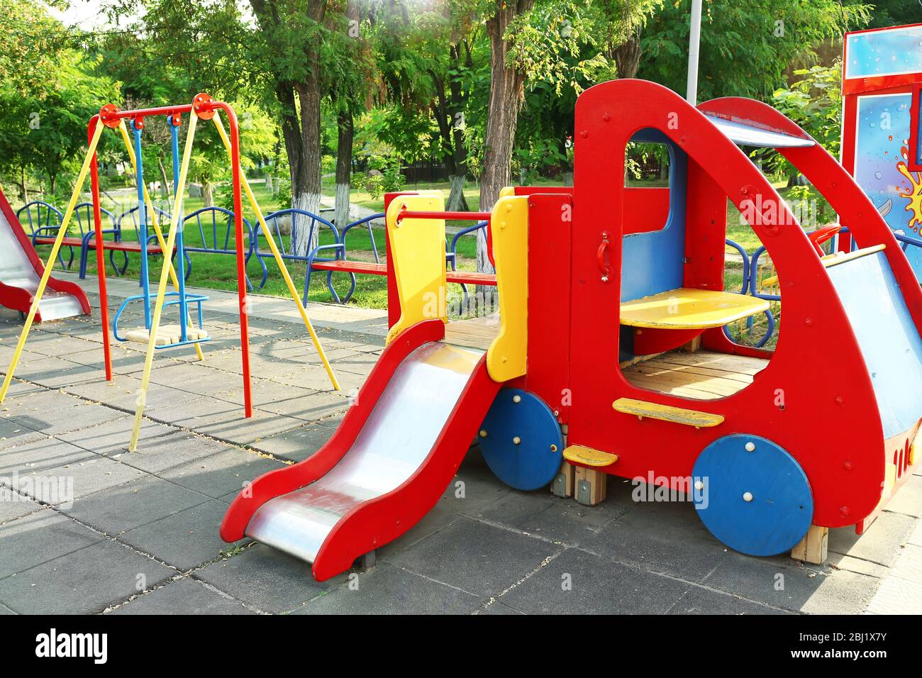 Colorful children playground in park Stock Photo - Alamy