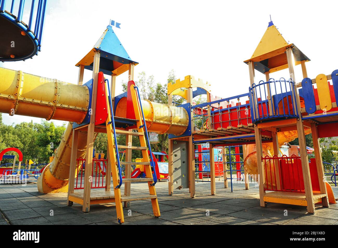 Colorful children playground in park Stock Photo - Alamy
