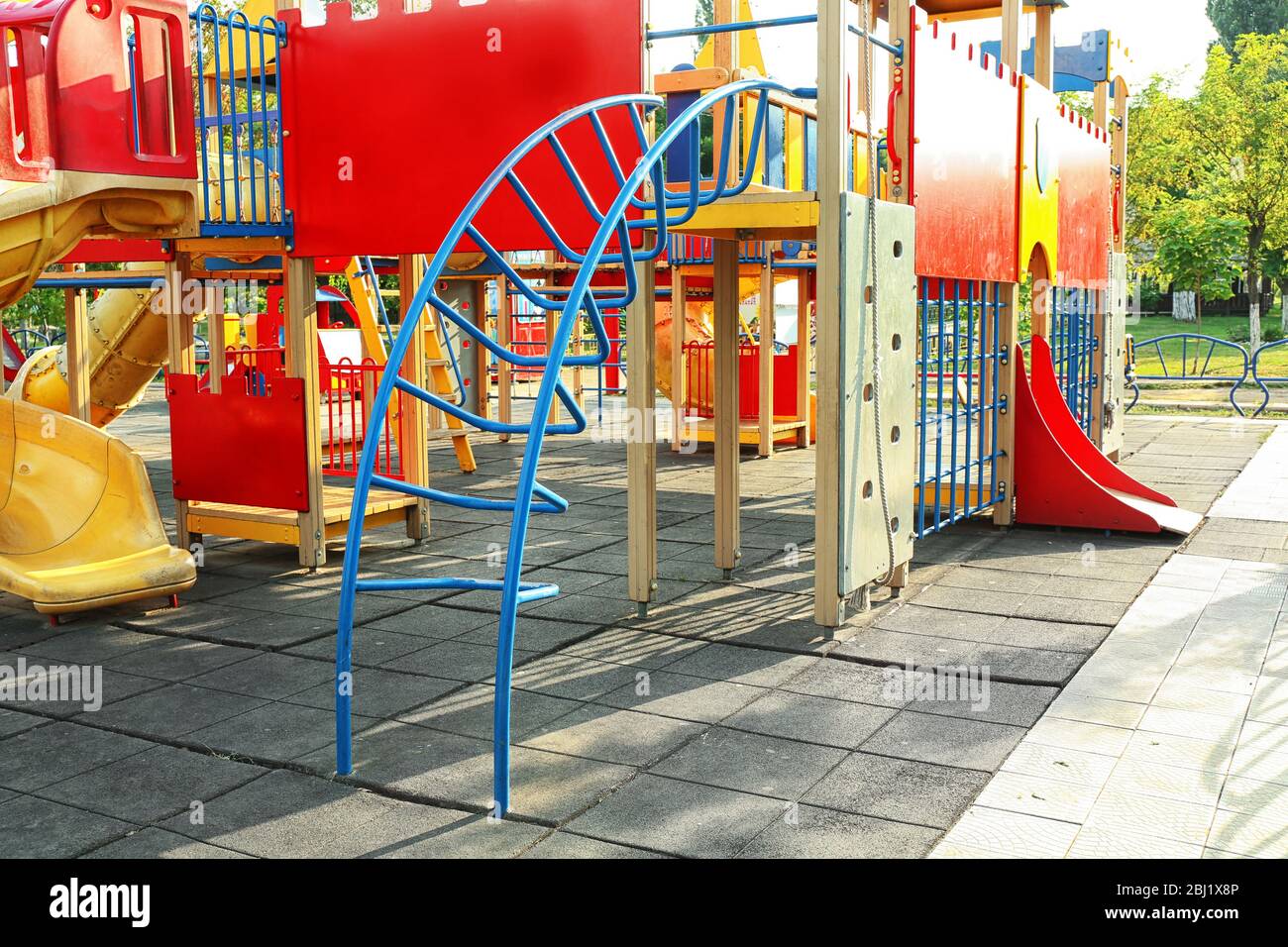 Colorful children playground in park Stock Photo - Alamy