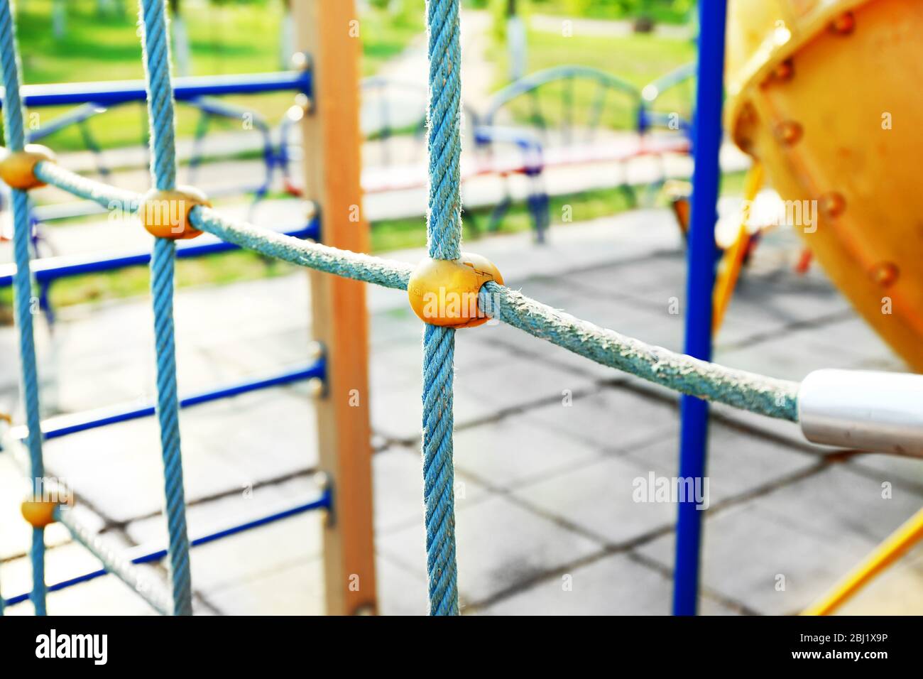 Climbing ropes on children playground in park Stock Photo - Alamy