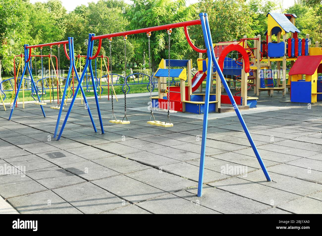 Colorful children playground in park Stock Photo - Alamy