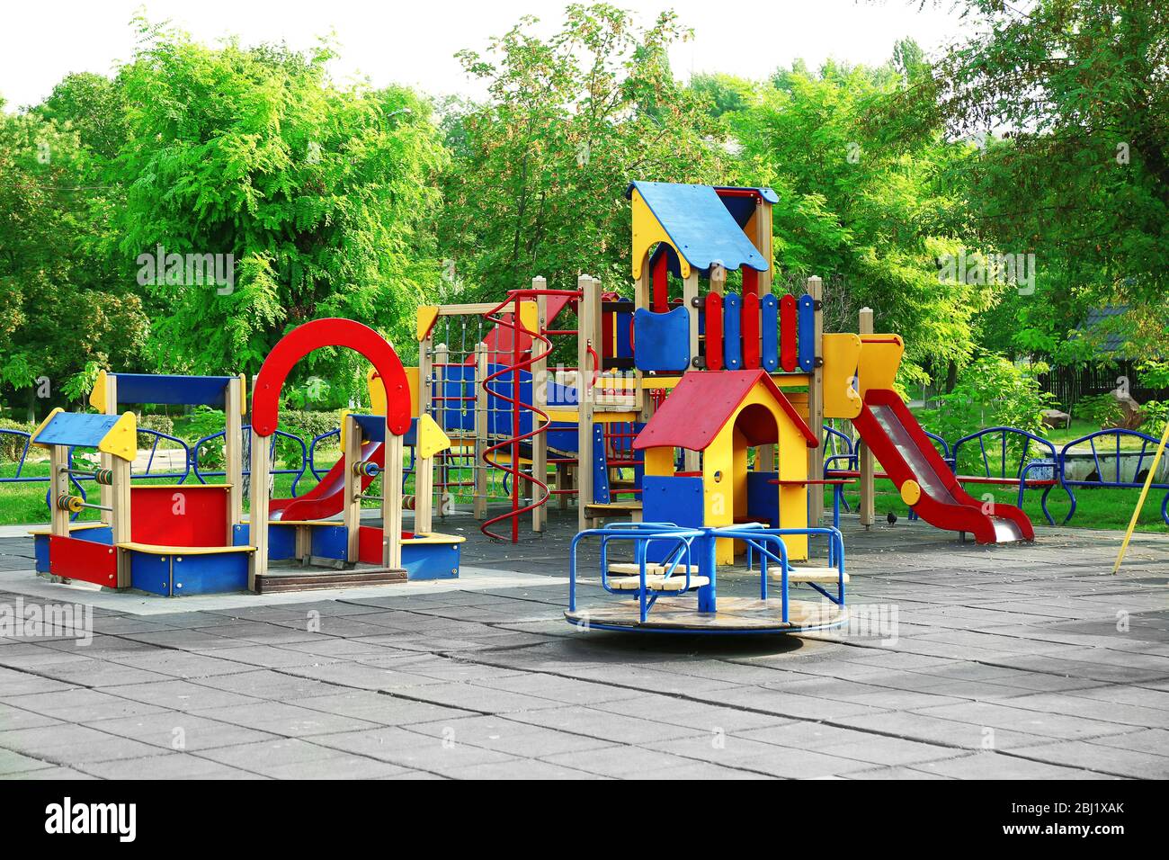 Colorful children playground in park Stock Photo - Alamy