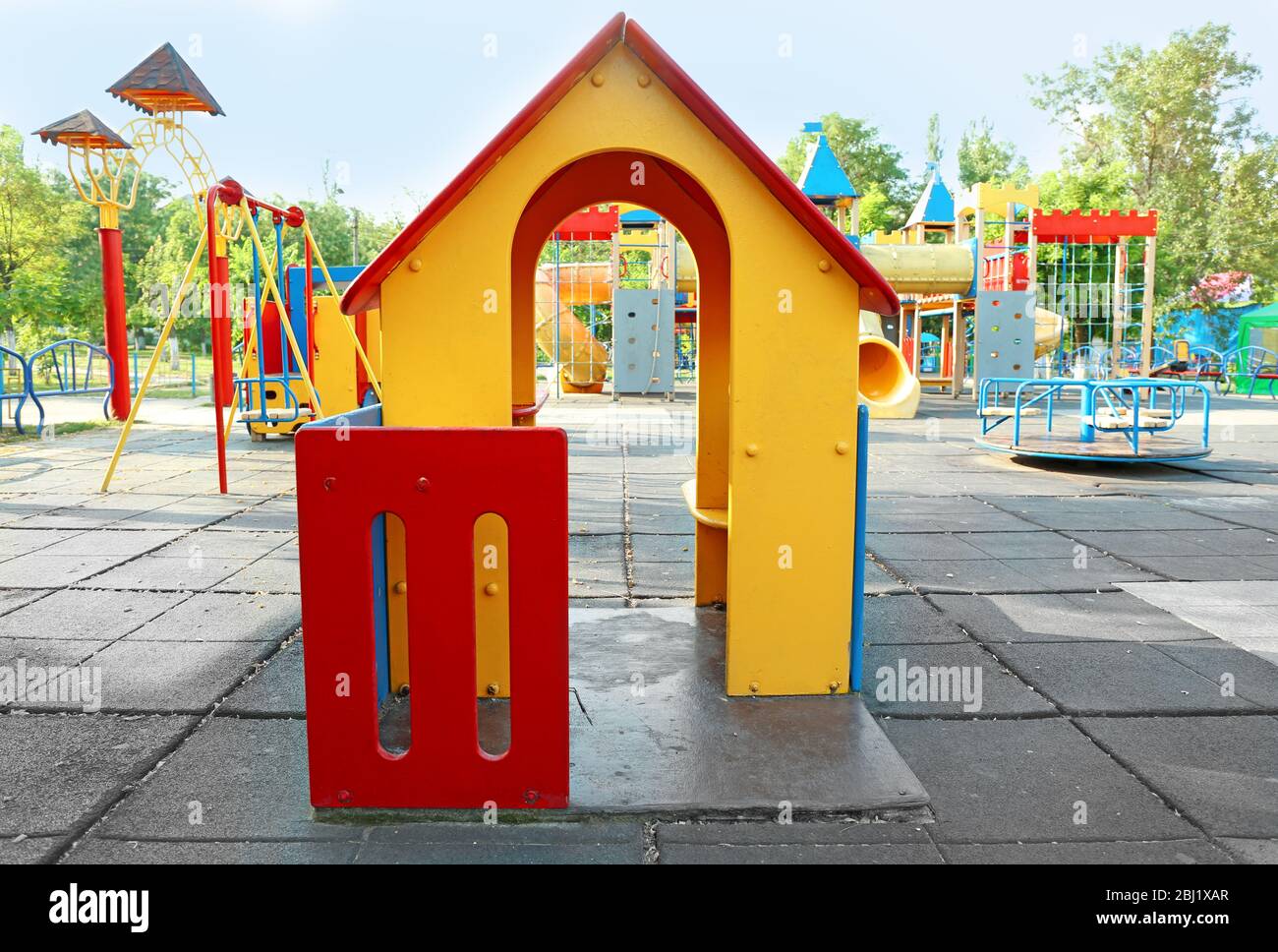Colorful children playground in park Stock Photo - Alamy