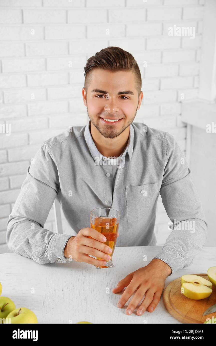 Man drinking glass apple juice hi-res stock photography and images - Alamy Man drinking glass apple juice hi-res stock photography and images - Alamy