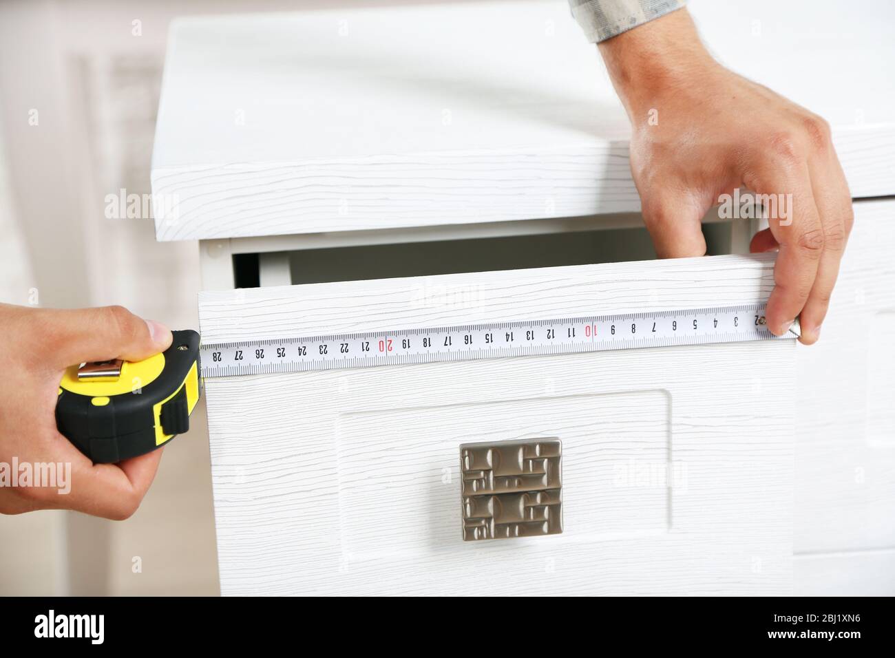 Man measuring chest tape measure hi-res stock photography and images ...