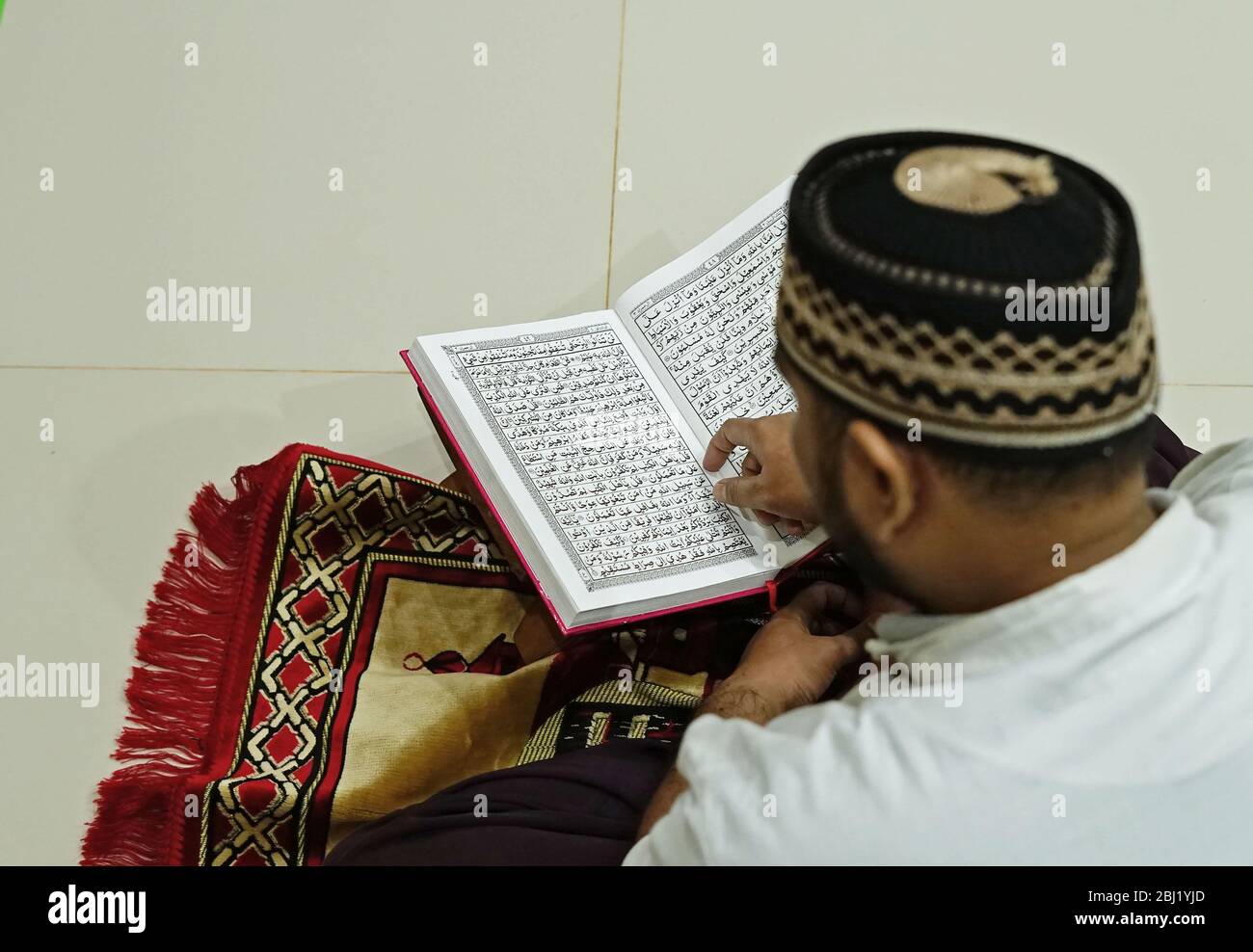 Indonesian Muslims prays in his mosque during Muslims’ holy month of ...