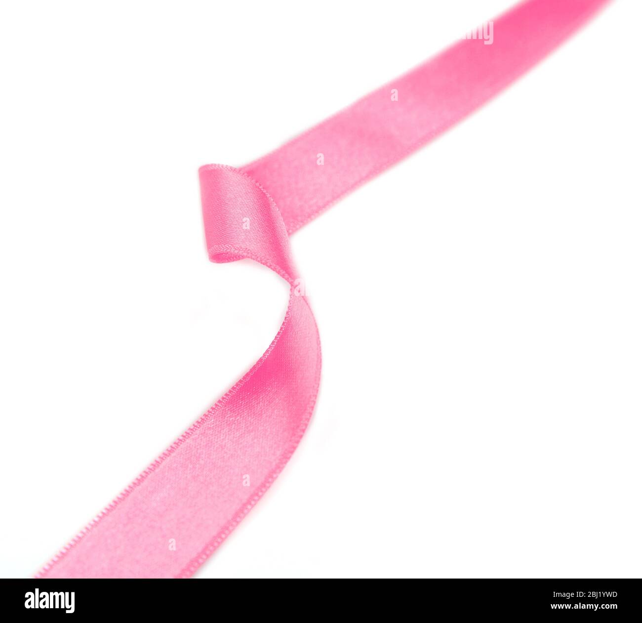 Pink curly ribbon isolated on white Stock Photo - Alamy