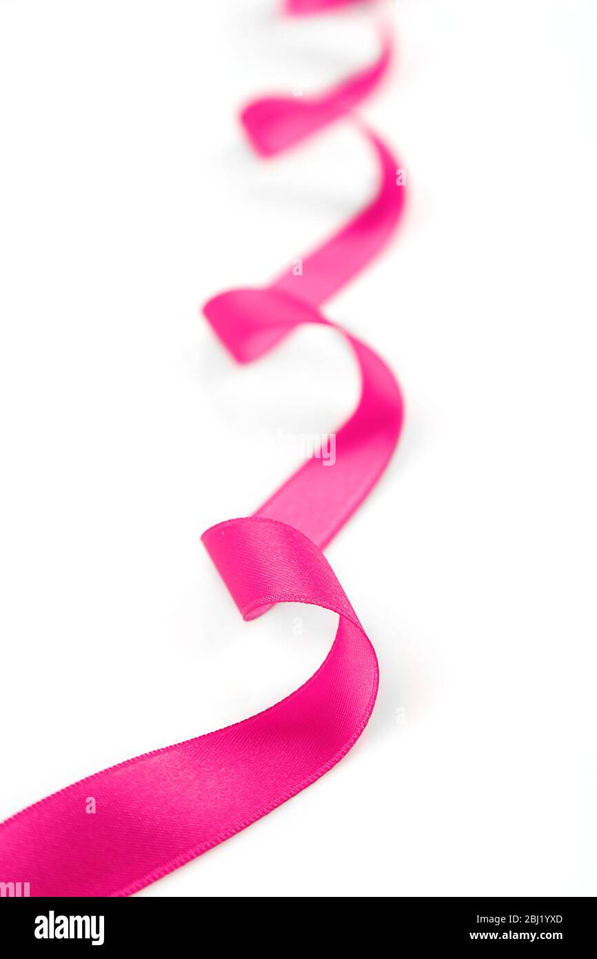 Pink curly ribbon isolated on white Stock Photo - Alamy
