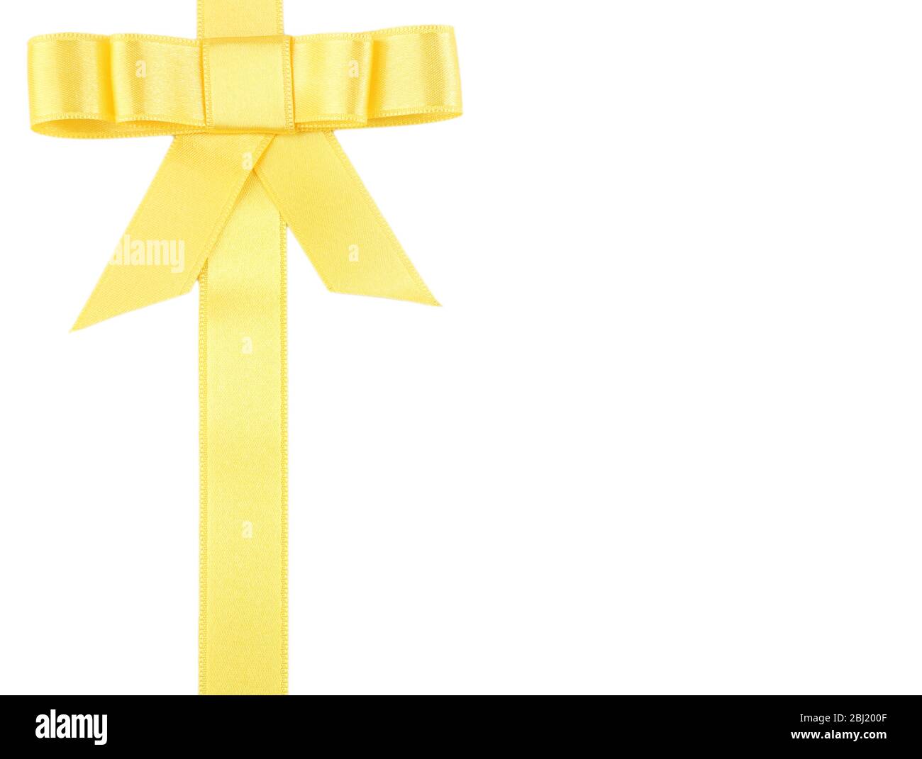 Yellow ribbon bow isolated on white Stock Photo - Alamy
