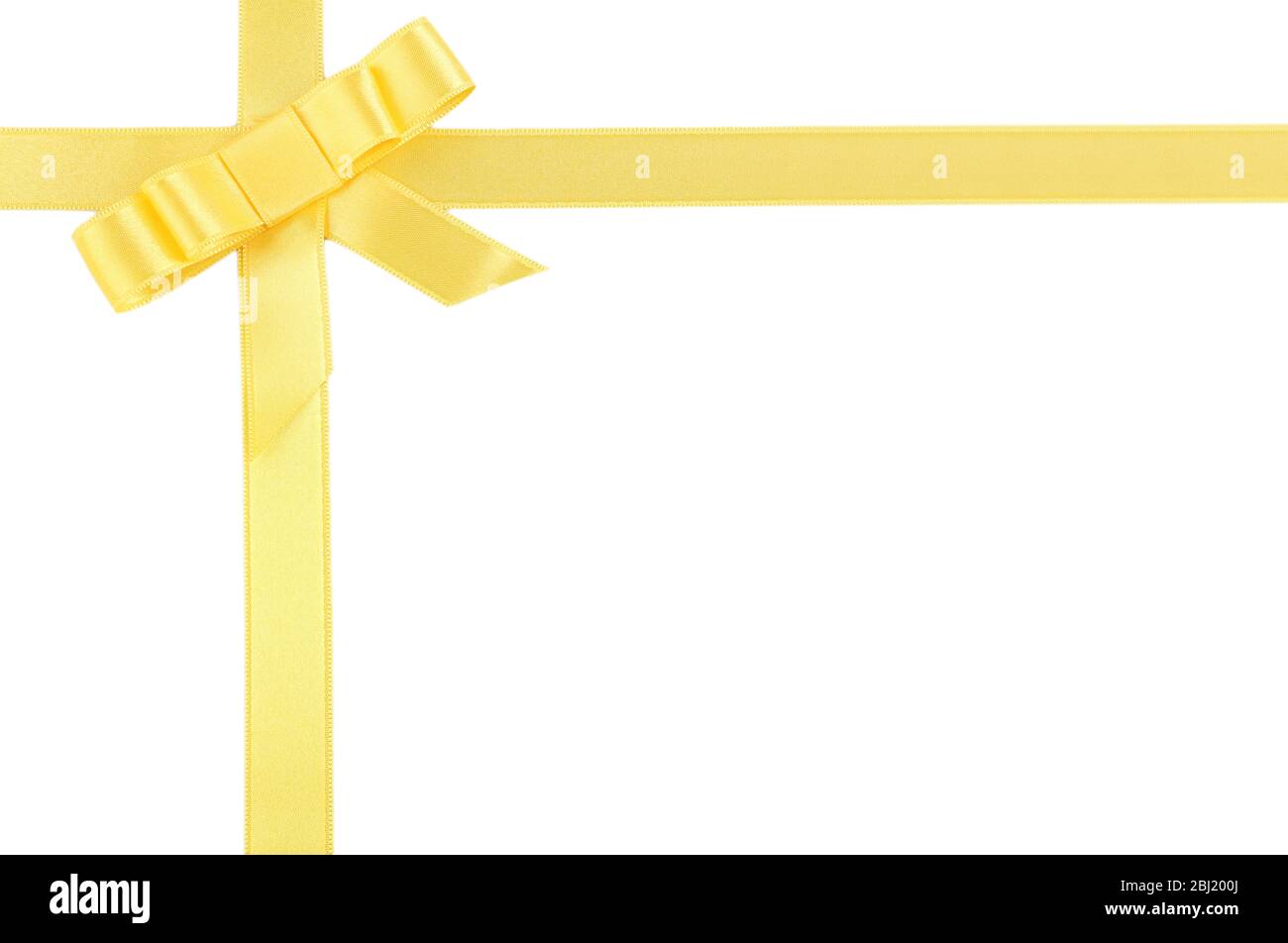 Yellow ribbon bow isolated on white Stock Photo - Alamy