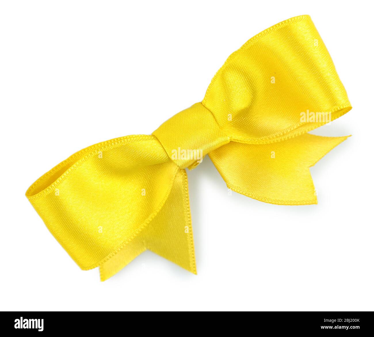 Yellow ribbon bow isolated on white Stock Photo - Alamy