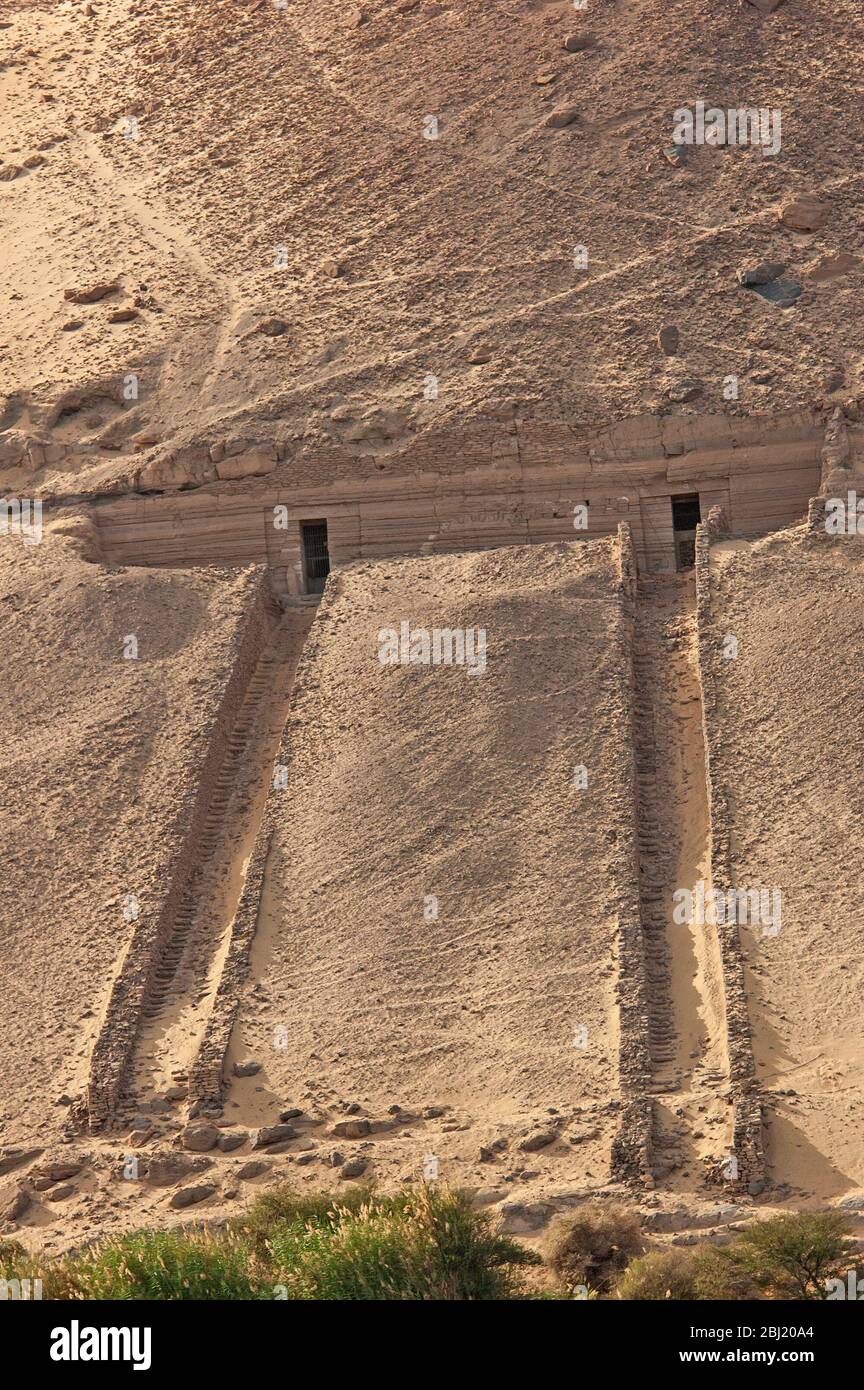 View of entrance to Tombs of Nobles mountain in Aswan Egypt Stock Photo ...