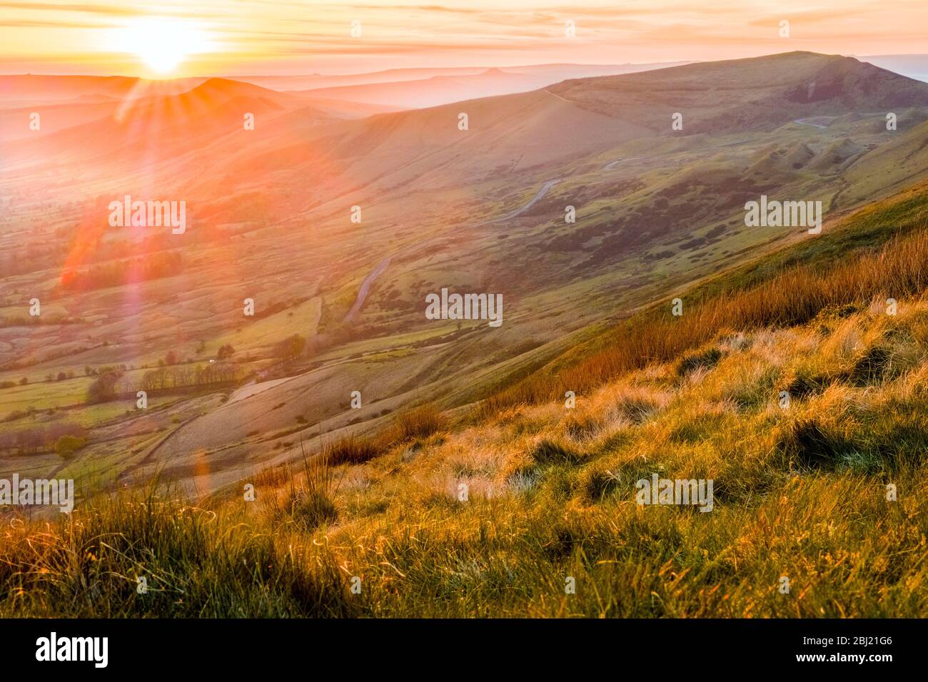 The sun rising over the Edale valley , Peak District National Park ...
