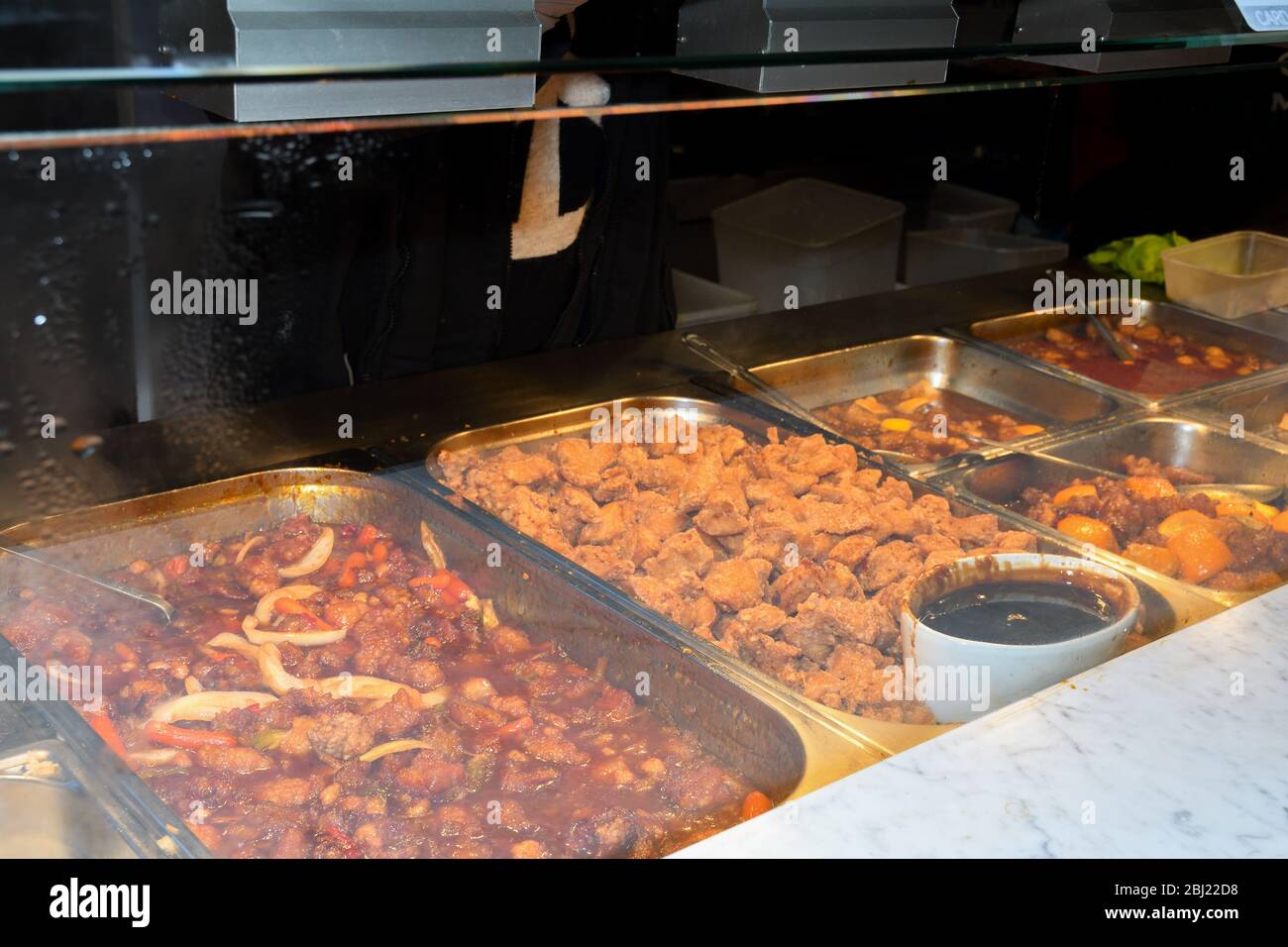 Asian food specialties, street food for sale at the market. Live ...